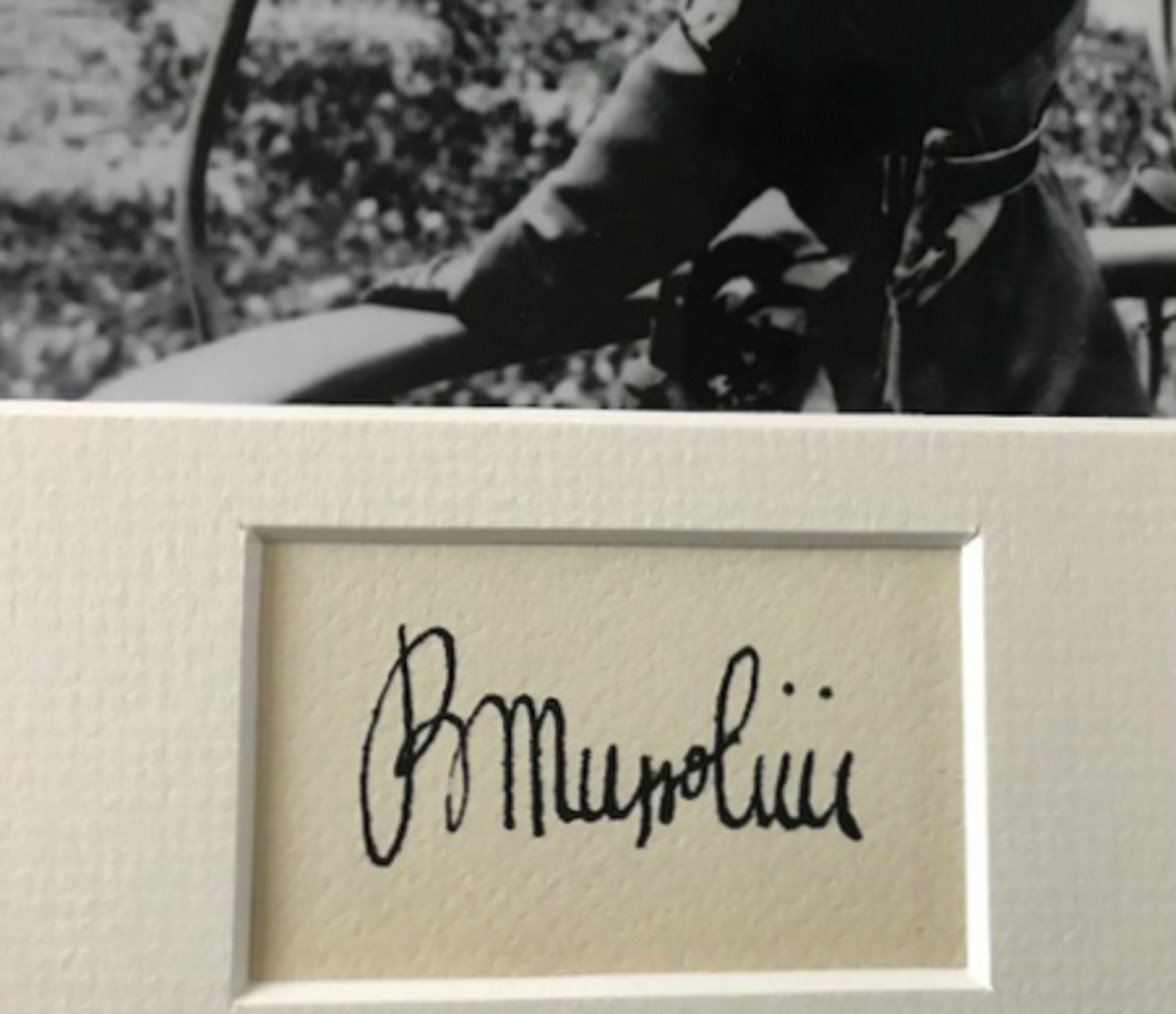 BENITO MUSSOLINI (1883-1945). Autograph professionally framed.