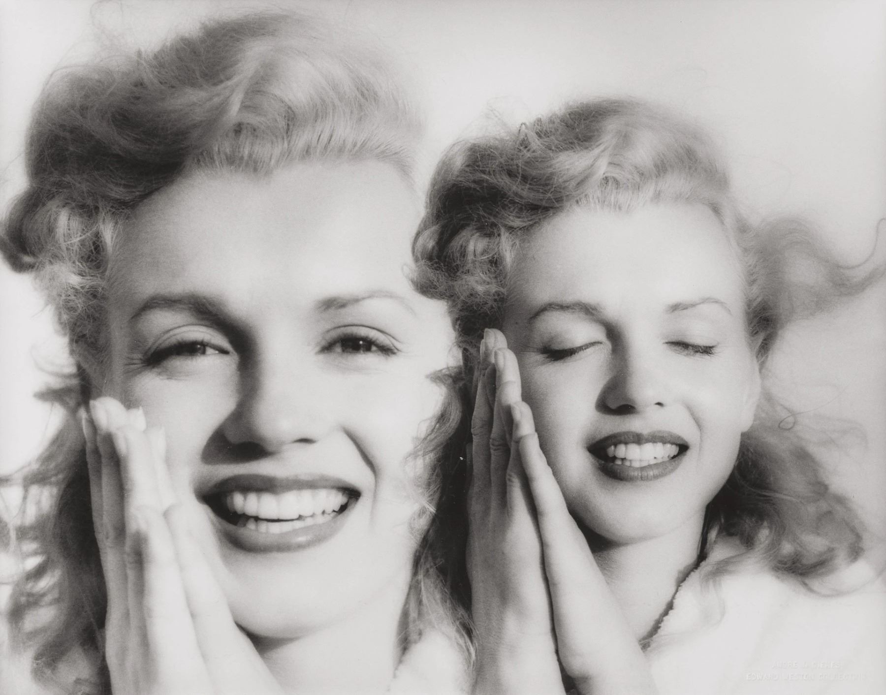 ANDRE DE DIENES (1913-1985): MARILYN MONROE in dressing gown.