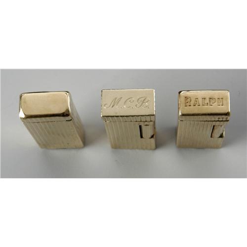 THREE 14K GOLD DUNHILL LIGHTERS THREE 14K GOLD DUNHILL LIGHTERS