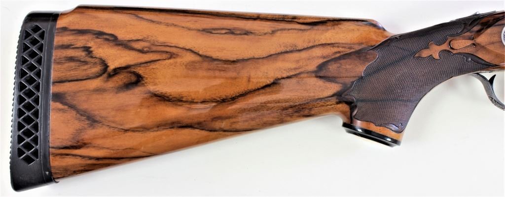 Master engraved Perazzi side plate 12ga. SN49856 O/U shotgun. At a cost ...