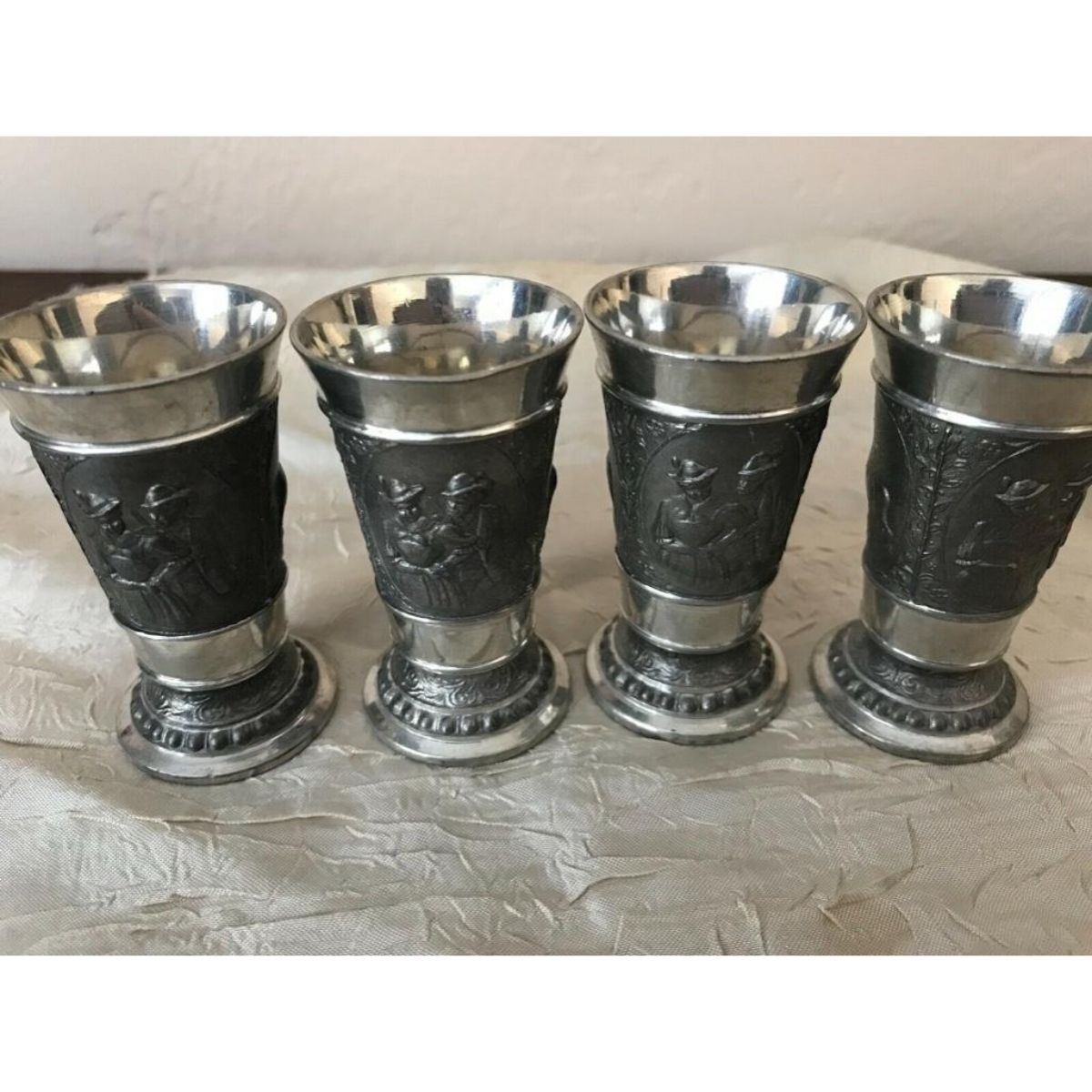 Set of German Pewter Repousse Hunting Goblets