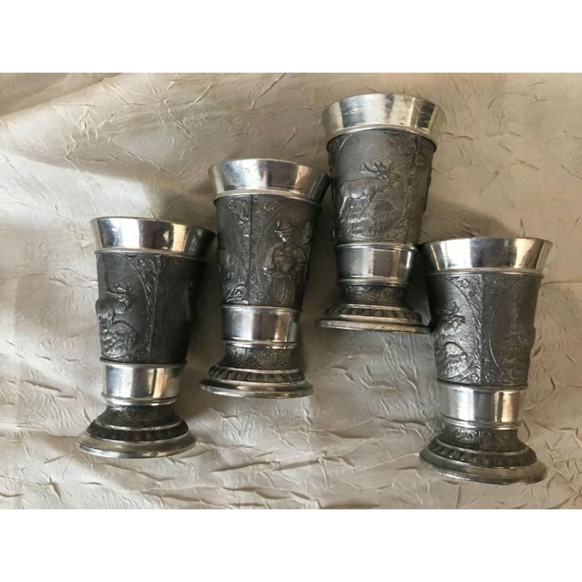 Set of German Pewter Repousse Hunting Goblets