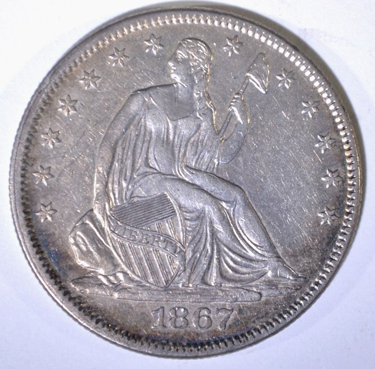 1867 SEATED LIBERTY HALF DOLLAR AU/BU