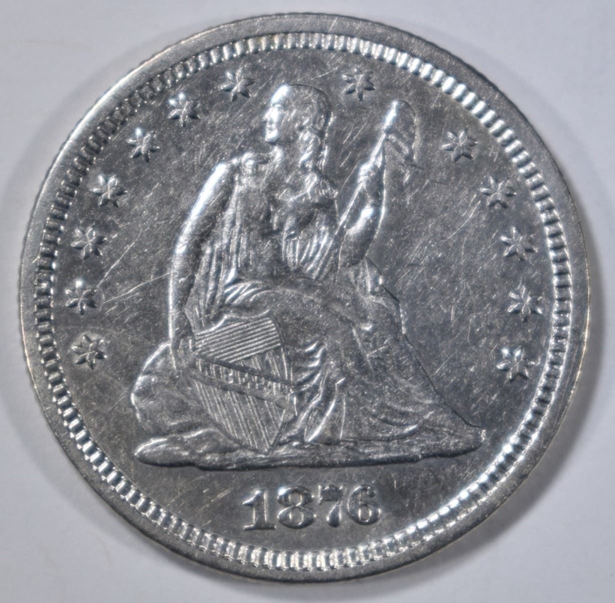 1876 SEATED LIBERTY QUARTER AU
