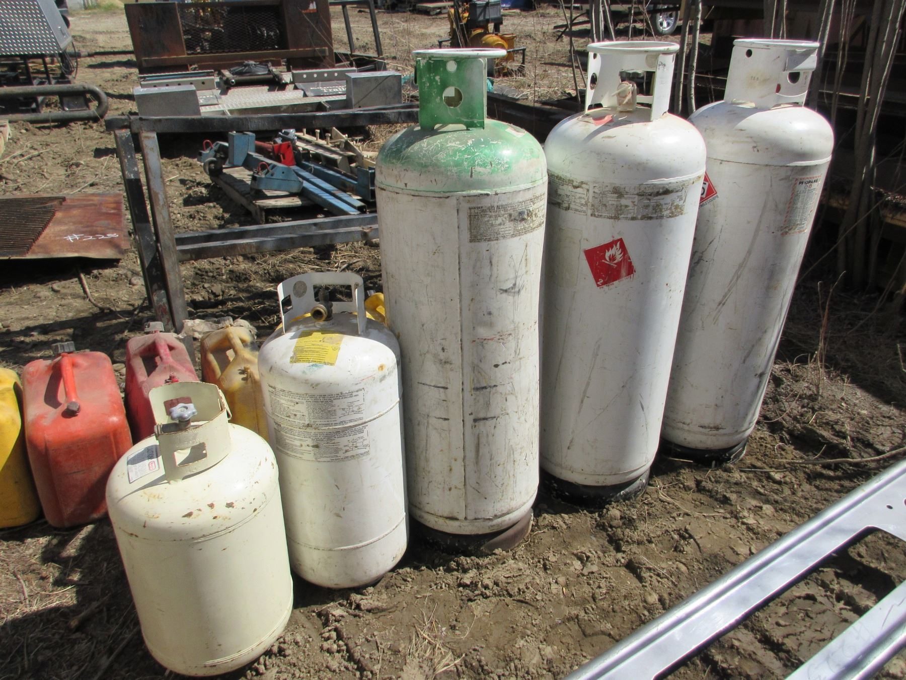 5 PROPANE TANKS