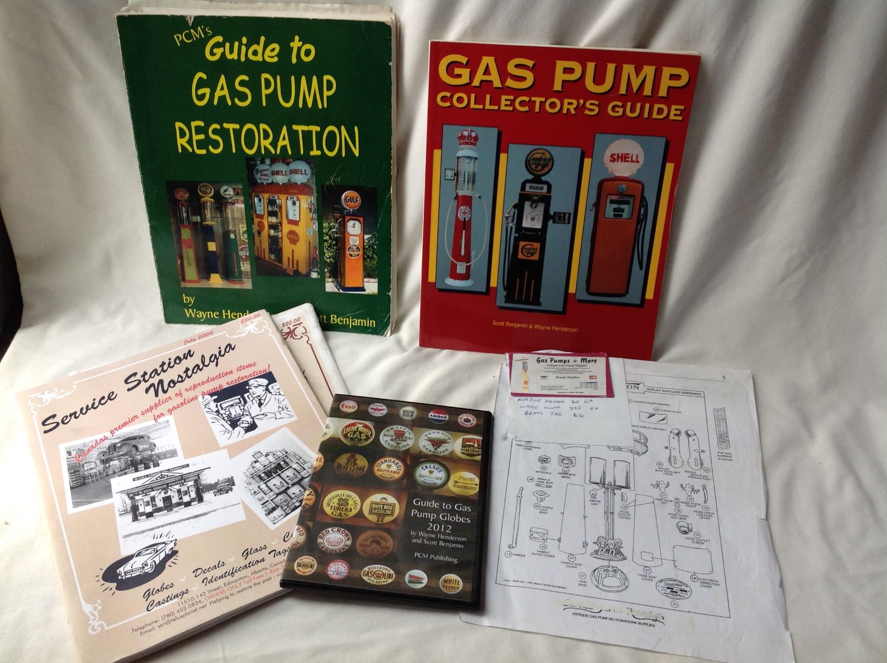 LOT OF BOOKS. GAS PUMP BOOK, CD, PARTS BOOKS FOR RESTORATION