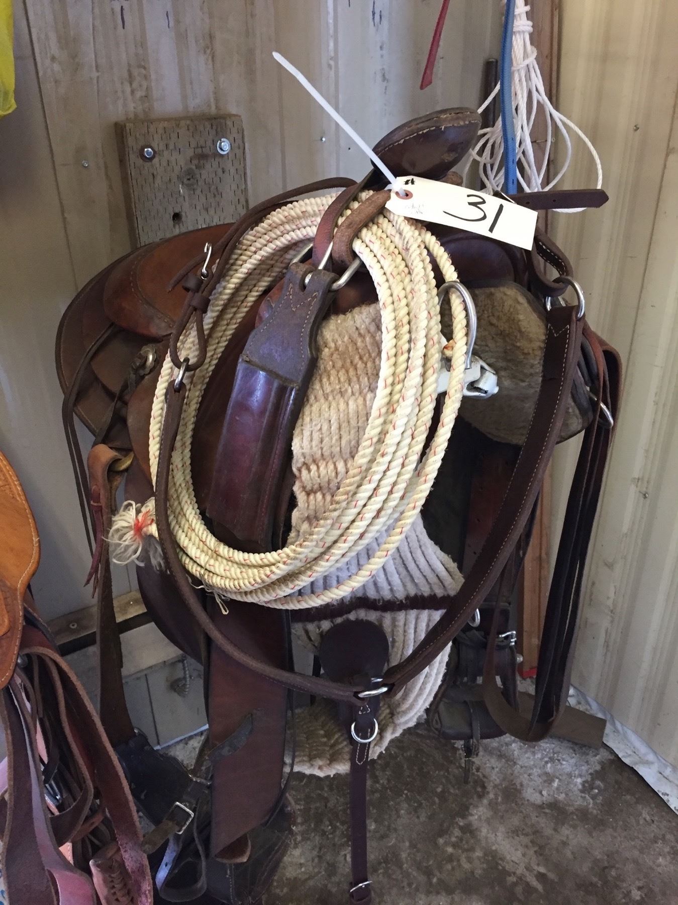 Western Rawhide Roper adult saddle comes with breast plate, and lariat,
