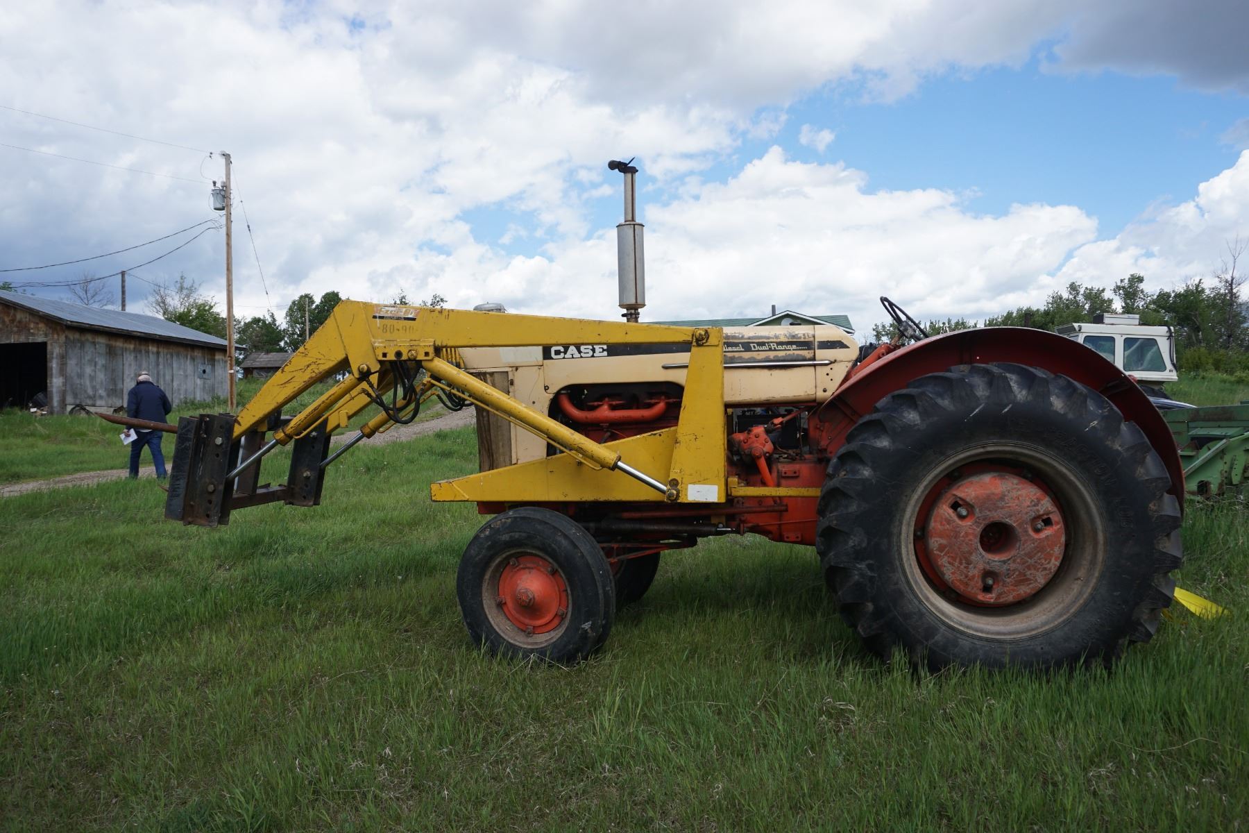 730 Case Tractor c/w loader & bale poke. Diesel & dual range. 1 good ...