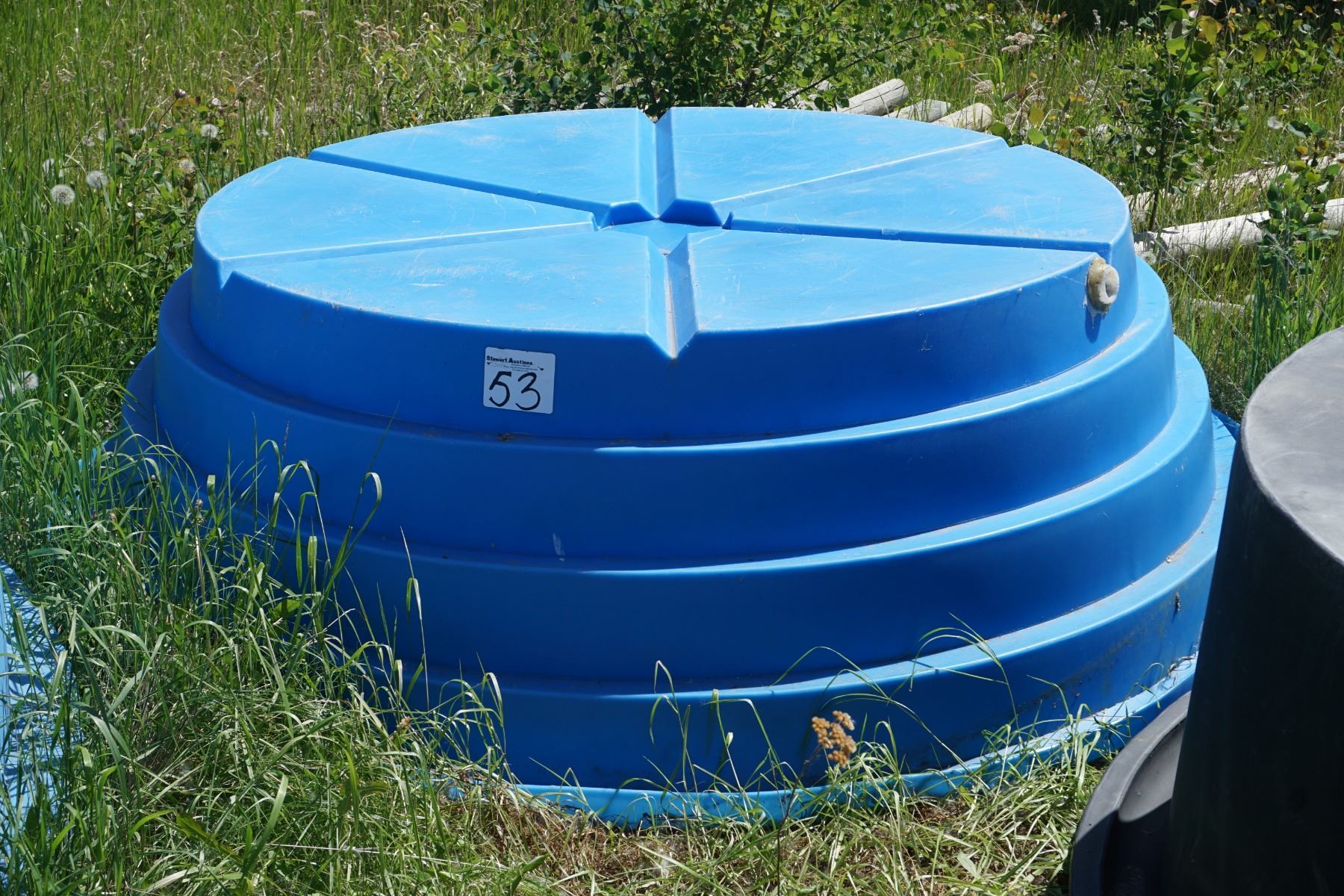 Blue plastic water trough