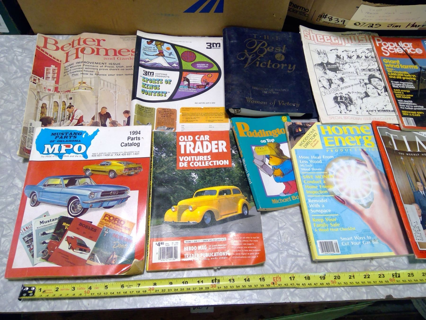 ASSORTMENT OF MAGAZINES AND VHS TAPES