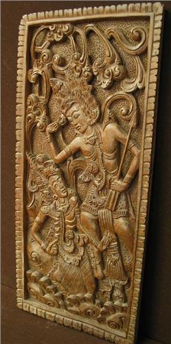 Java relief carved wood panel on revers