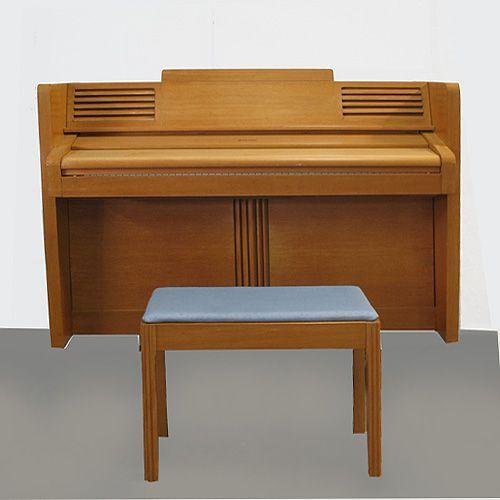 Janssen spinet piano and bench in Champagne;