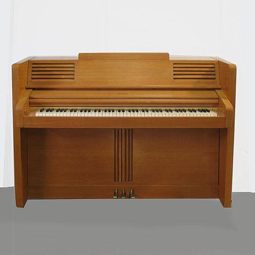 Janssen spinet piano and bench in Champagne;