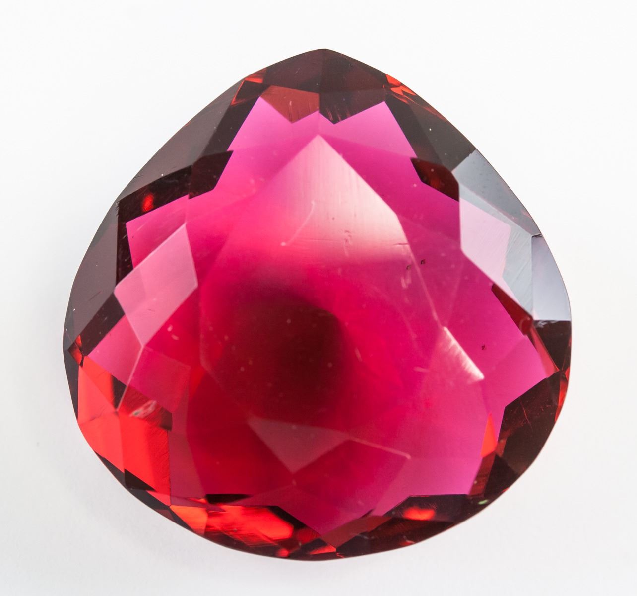 107.00ct Pear Cut Red Topaz GGL Certificate