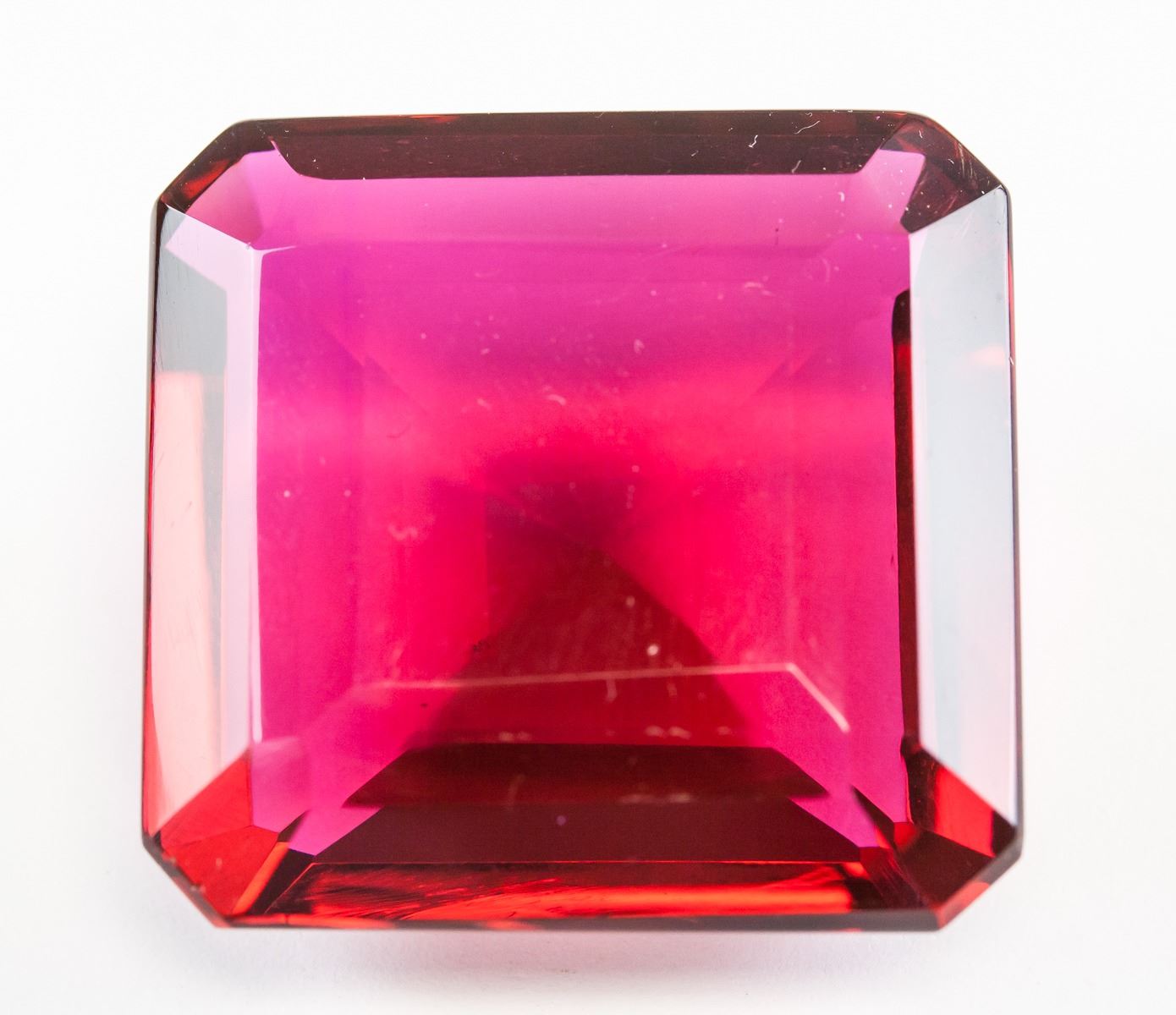 88.25ct Emerald Cut Red Topaz GGL Certificate