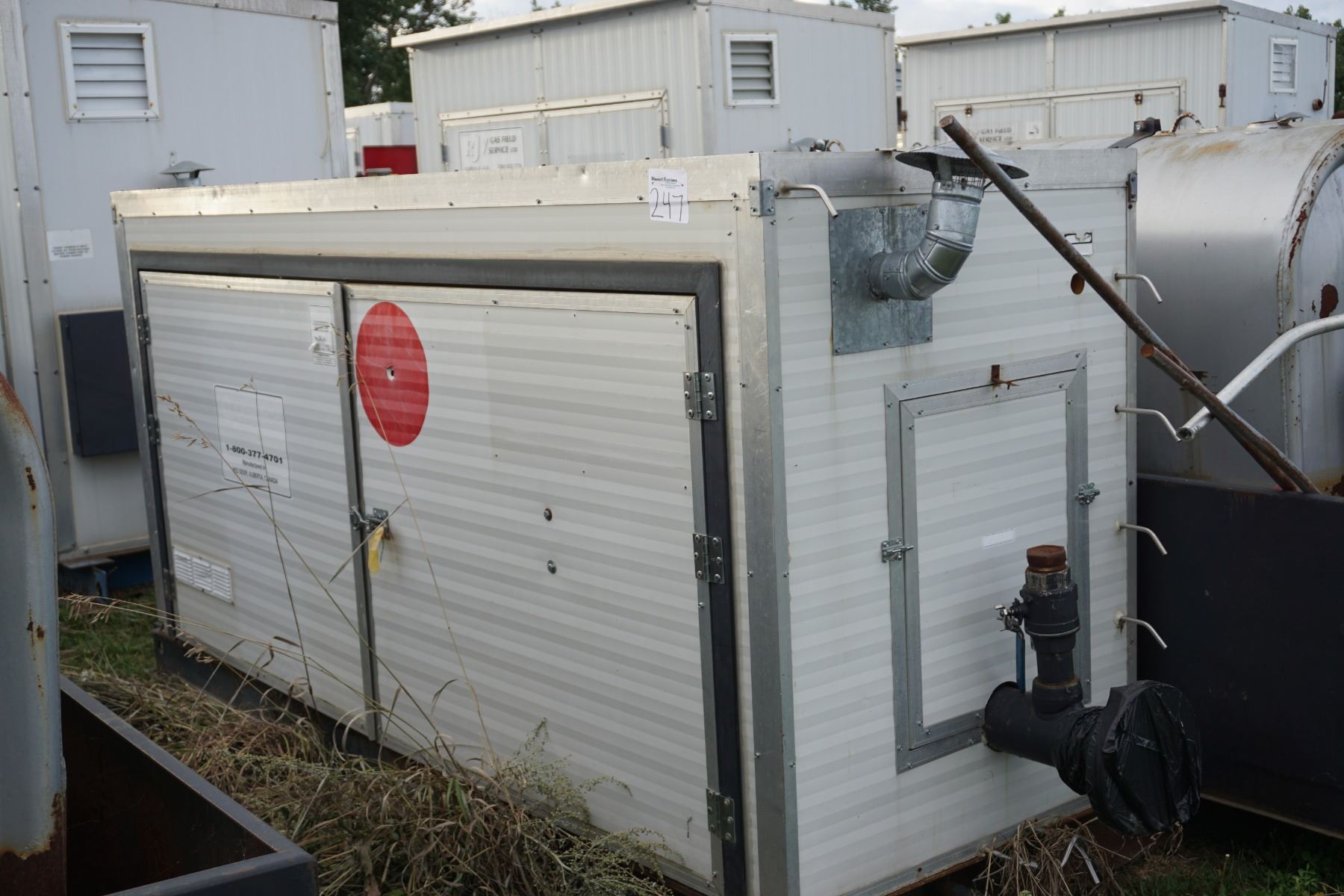 Oilfield shack comes with oval tank, pipes etc still inside. 9' long, 3 ...