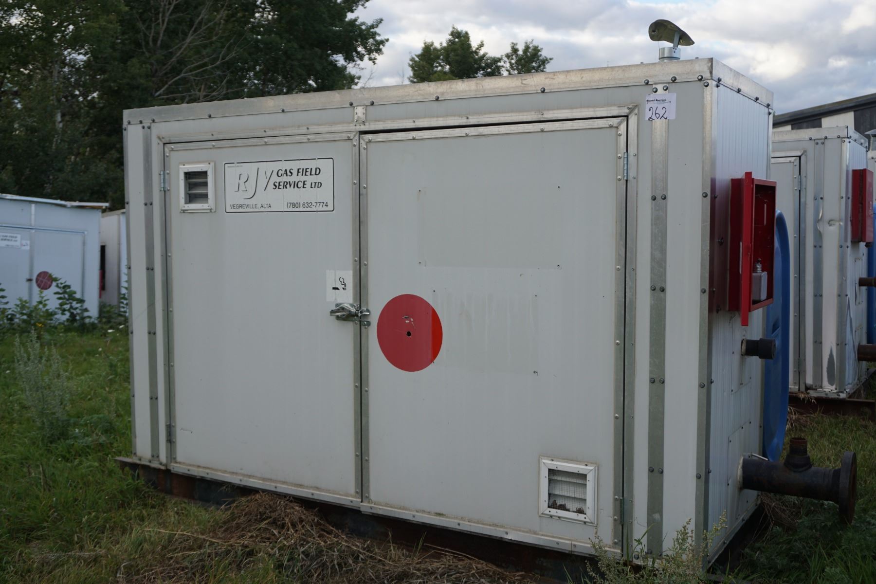 Oilfield shack loaded inside, comes with catalystic heater and tank.