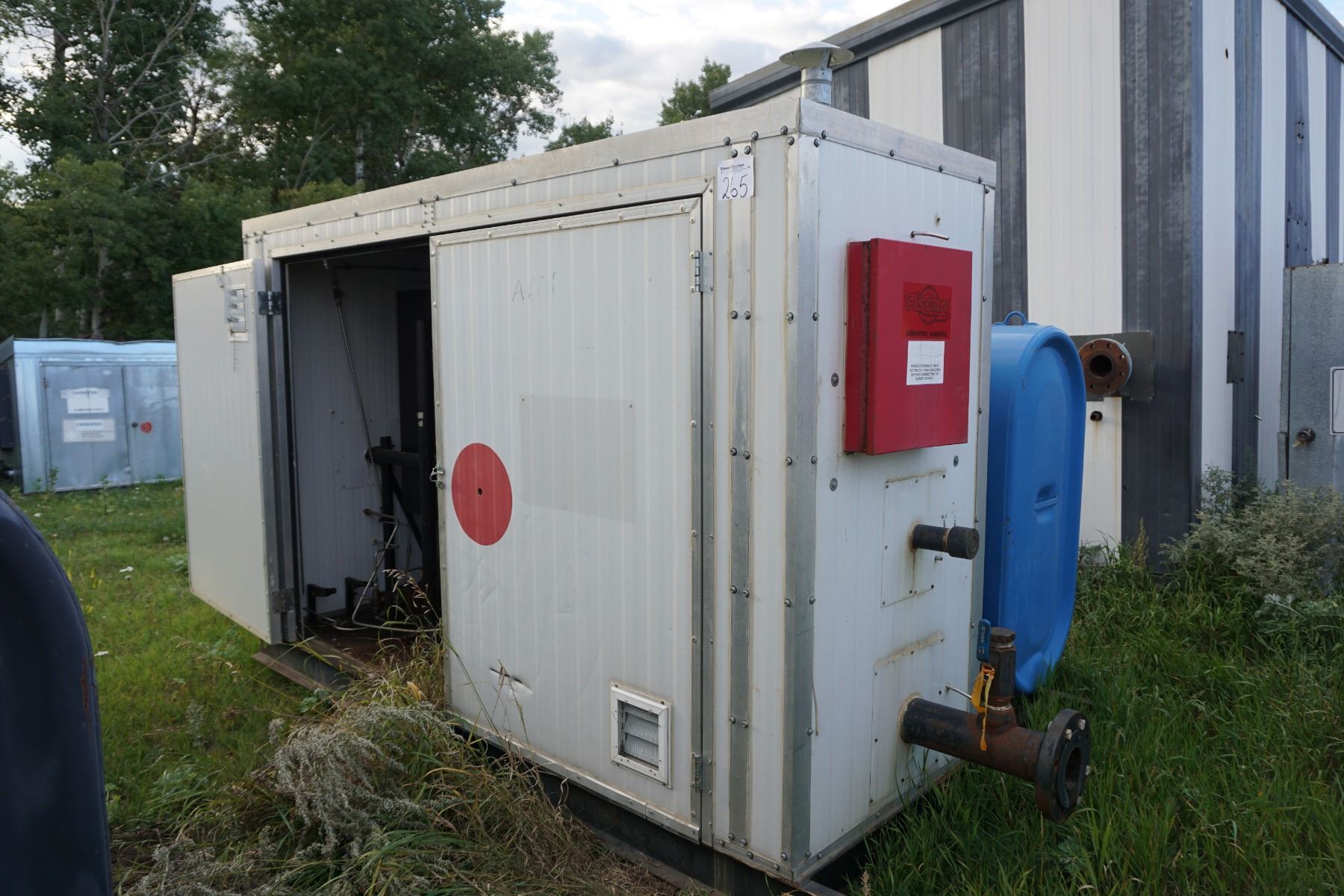 Oilfield shack loaded inside, comes with catalystic heater and tank.