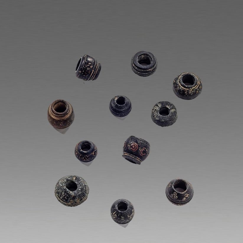 Lot of 11 Ancient Roman Stone Spindle Whorls c.1st-4th century AD.