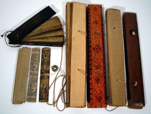 A COLLECTION OF FOUR PALM LEAF BOOKS