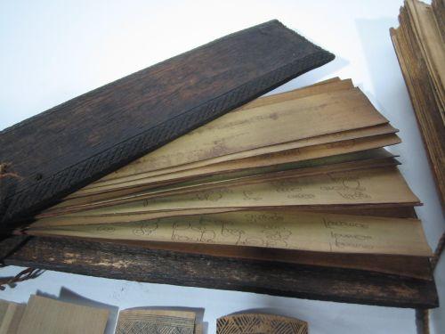 A COLLECTION OF FOUR PALM LEAF BOOKS