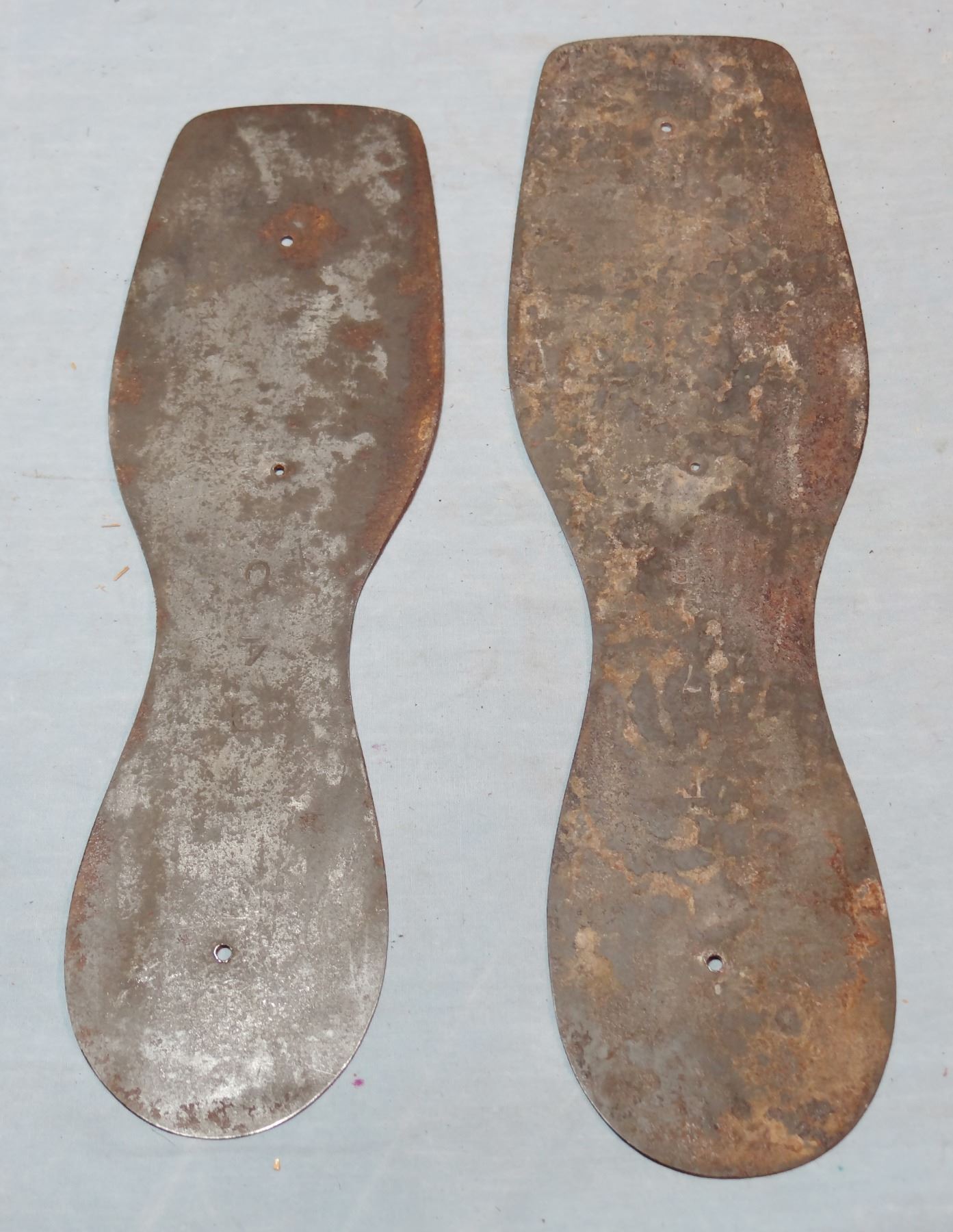 Shoe store display, metal sole guilds and 1861 U. S. steel shoe templates
