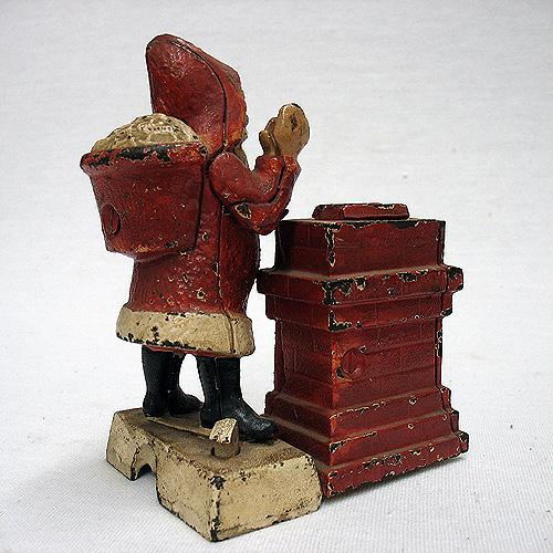 Cast iron Santa Claus mechanical bank;