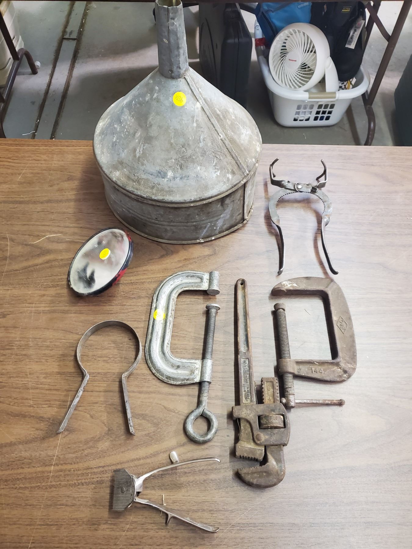 ANTIQUE FUNNEL, CLAMPS, HAIR CUTTERS, CANNING TOOLS AND 40'S TRUCK MIRROR