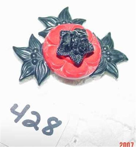 Black & red bakelite pin