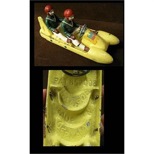 Enameled metal Bobsled toy, heavy, made