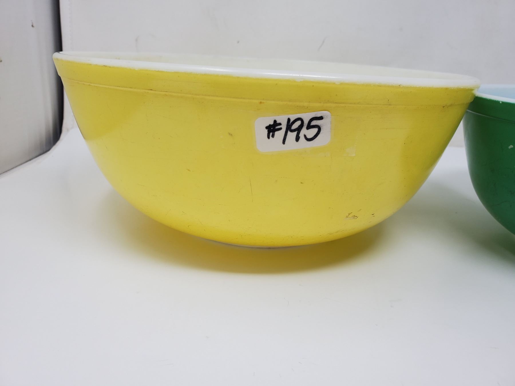 195. Pyrex, primary set, yellow, green, red and blue bowls