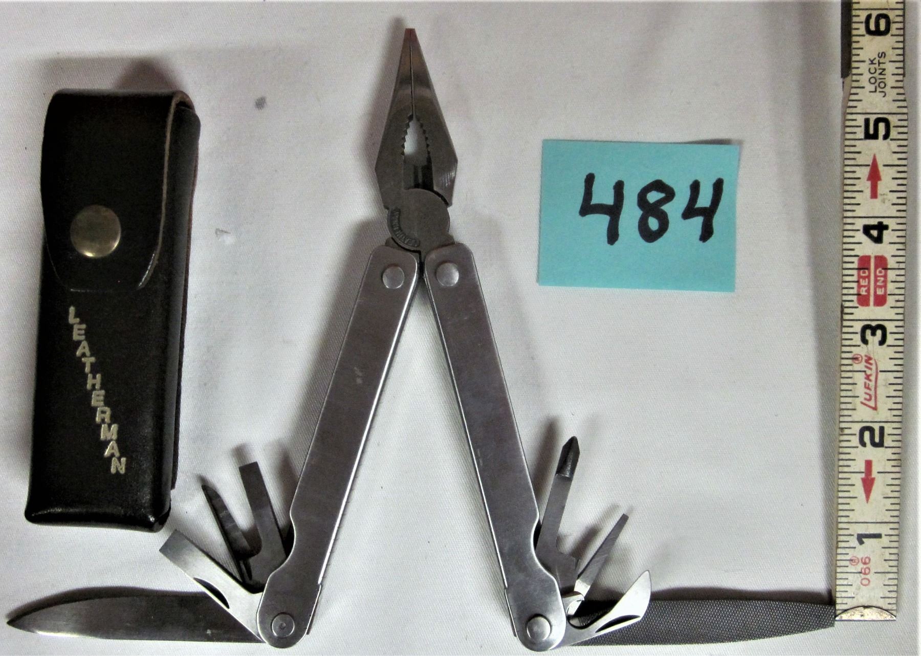 Leatherman Multi purpose tool/case 9 function - Schmalz Auctions