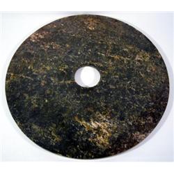 AN OUTSTANDING LARGE CHINESE NEOLITHIC JADE PI DISC