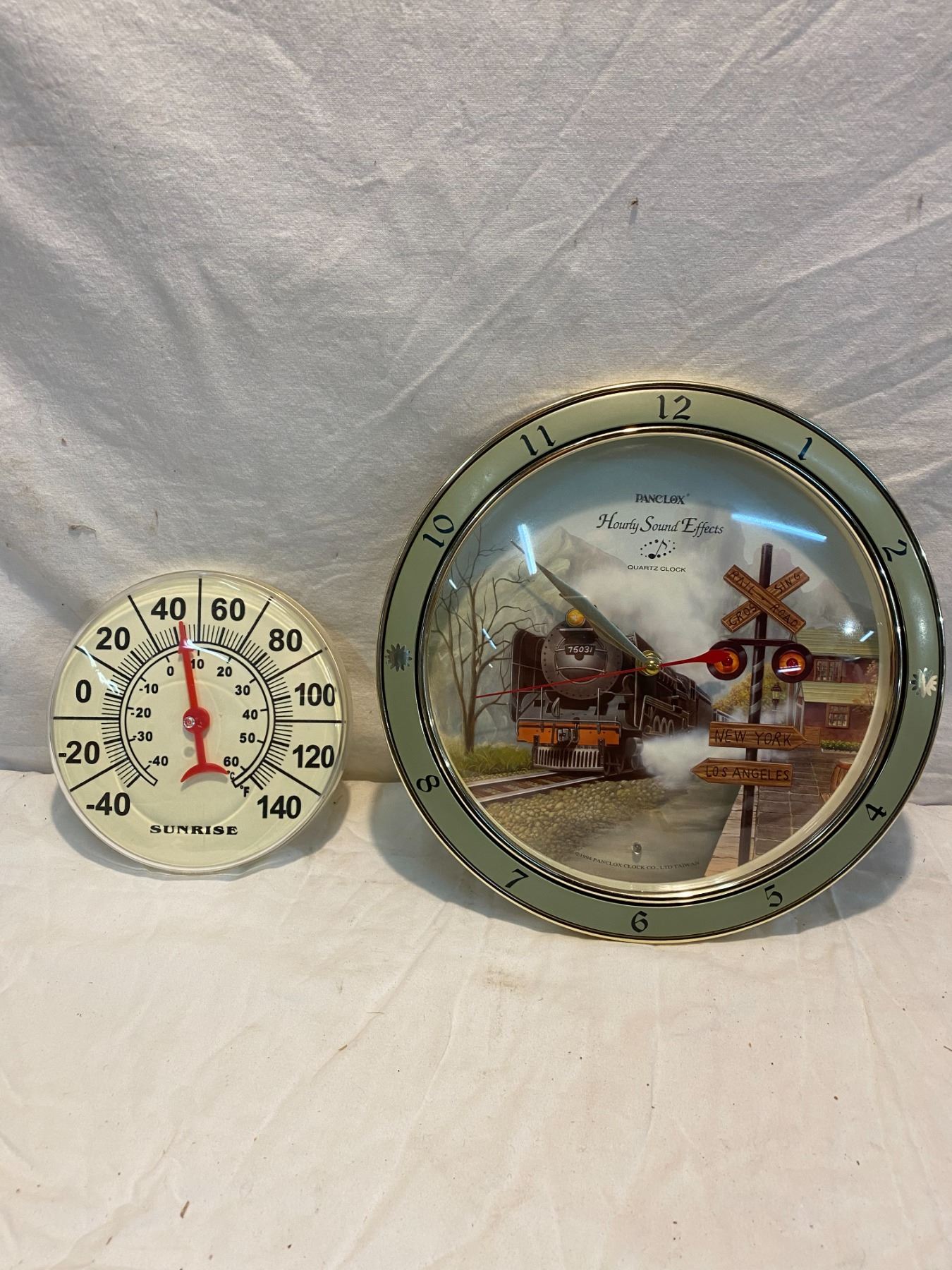 Battery operated clock and thermometer