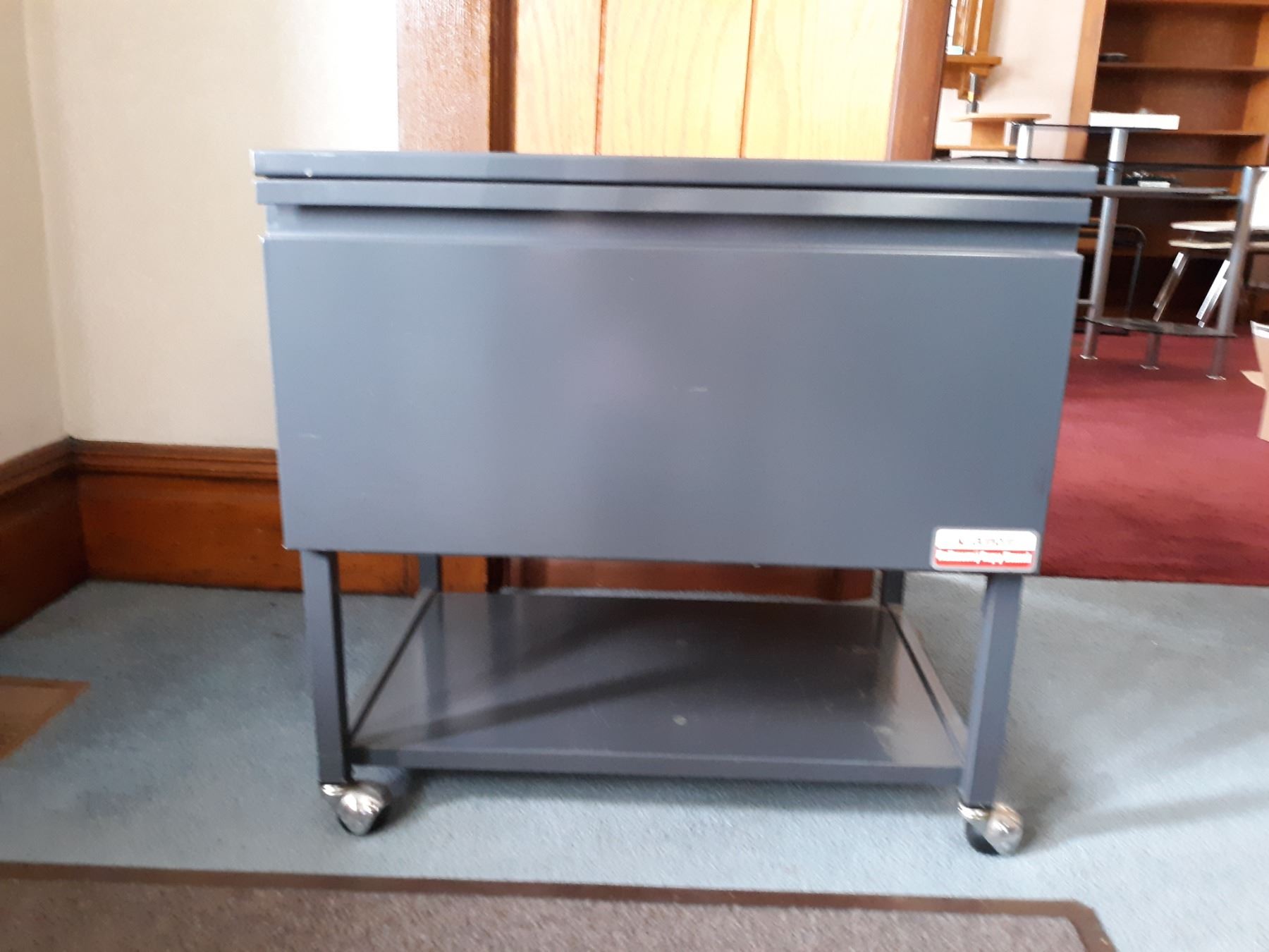 METAL DROP LEAF TABLE ON WHEELS