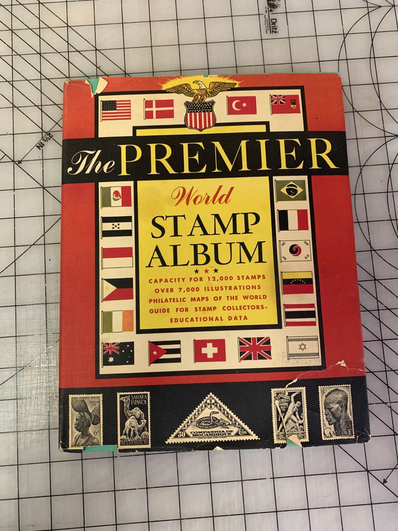PREMIER WORLD STAMP ALBUM BOOK WITH MANY STAMPS