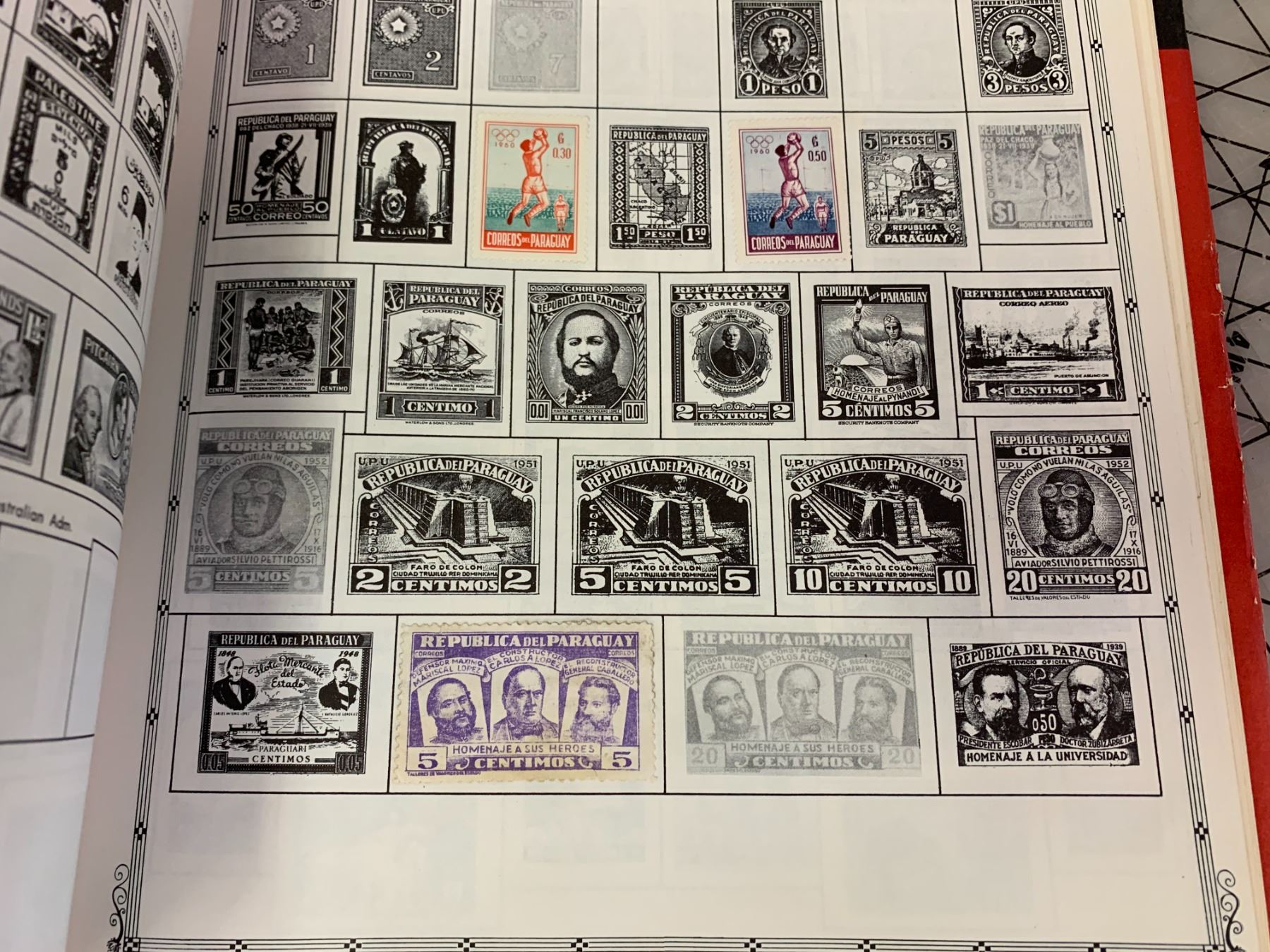 PREMIER WORLD STAMP ALBUM BOOK WITH MANY STAMPS - Schmalz Auctions