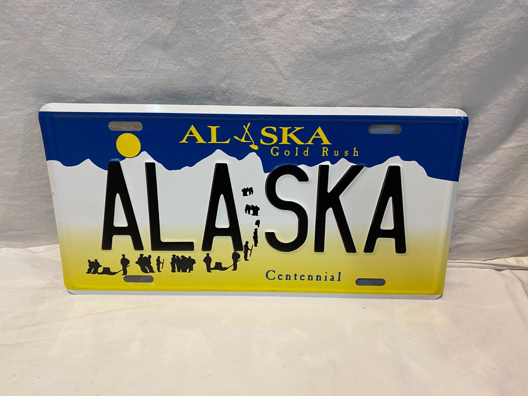 Alaska gold rush centennial license plate