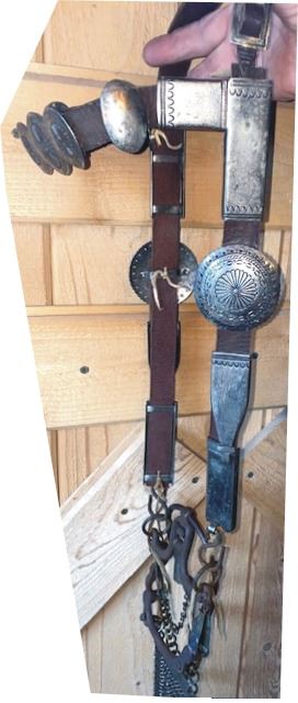 Navajo silver headstall with a very ornate Mexican ring bit