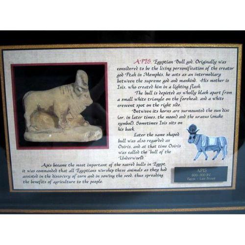 A FINE LIMESTONE SCULPTURE OF AN APIS BULL,