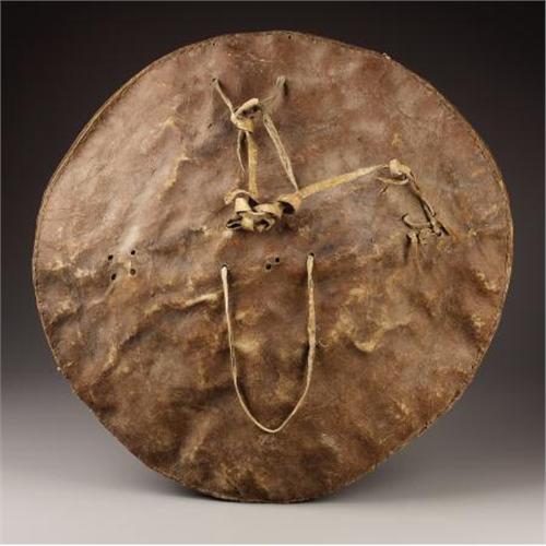 A PUEBLO PAINTED BUFFALO HIDE SHIELD c. 18