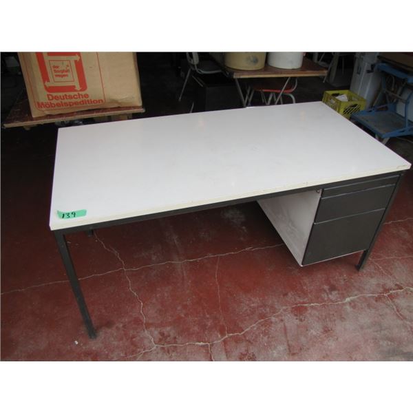 single pedestal steel frame desk with run off