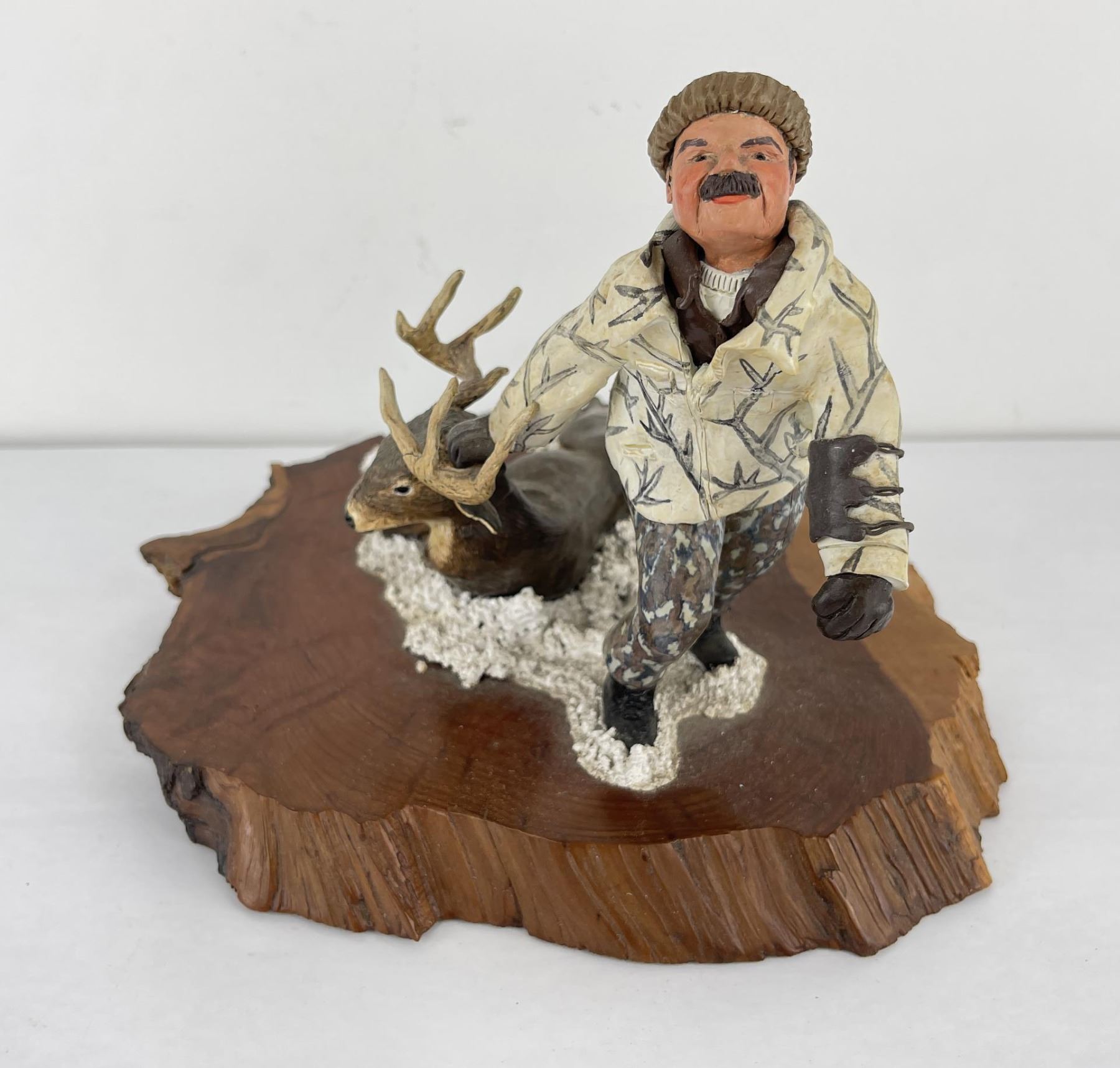 Sculpture of Gene Wensel Dragging His Deer