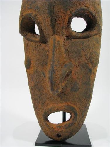 AN OLD IATMUL CANOE SHIELD ANCESTOR MASK