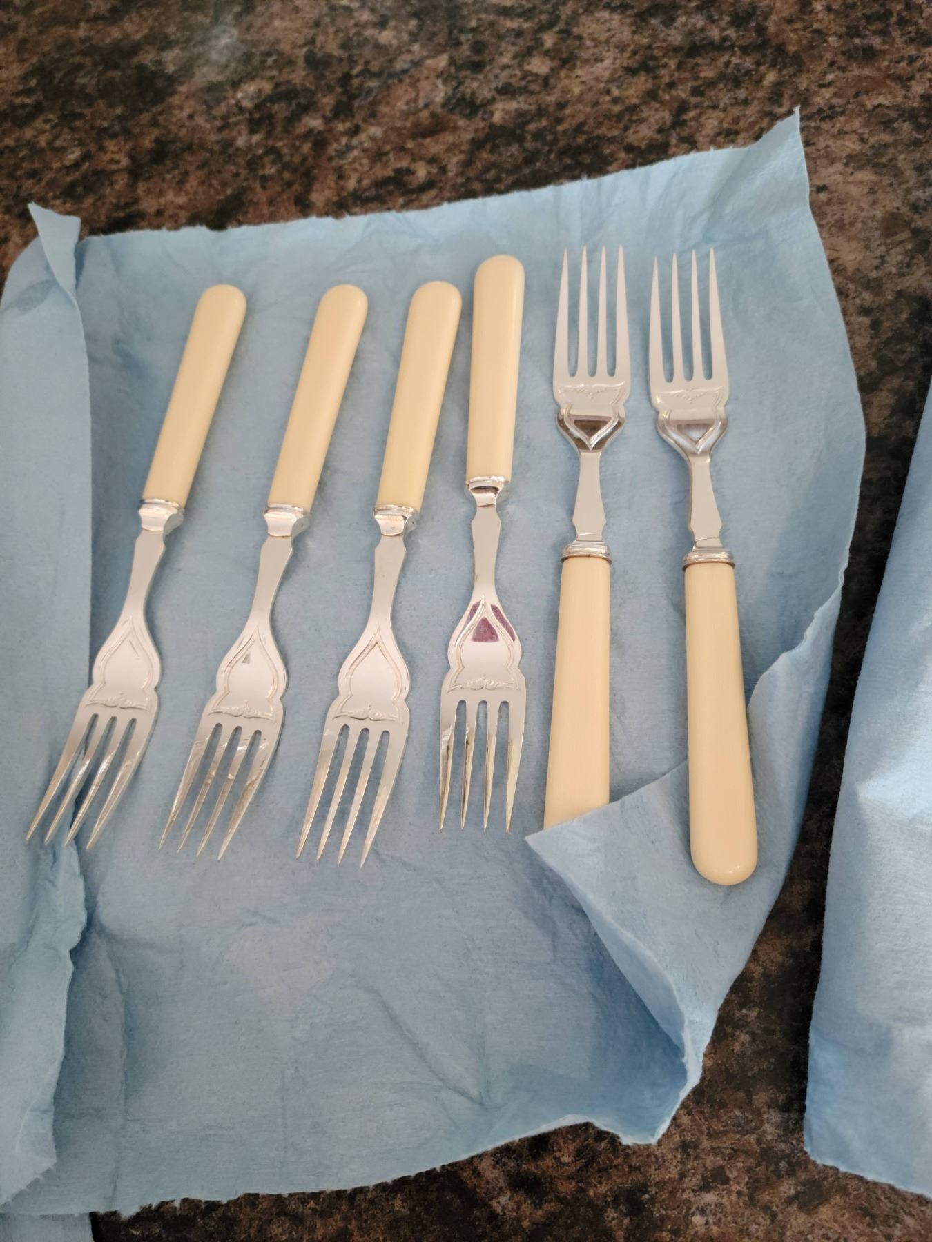 French ivory (faux) fish fork set