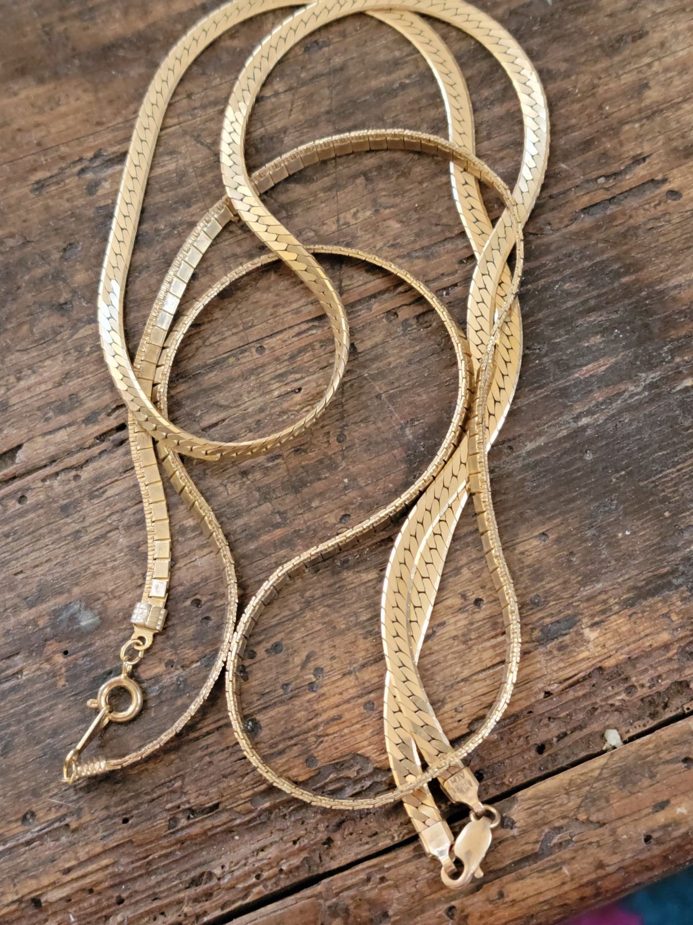 two goldtone chains one marked 10K