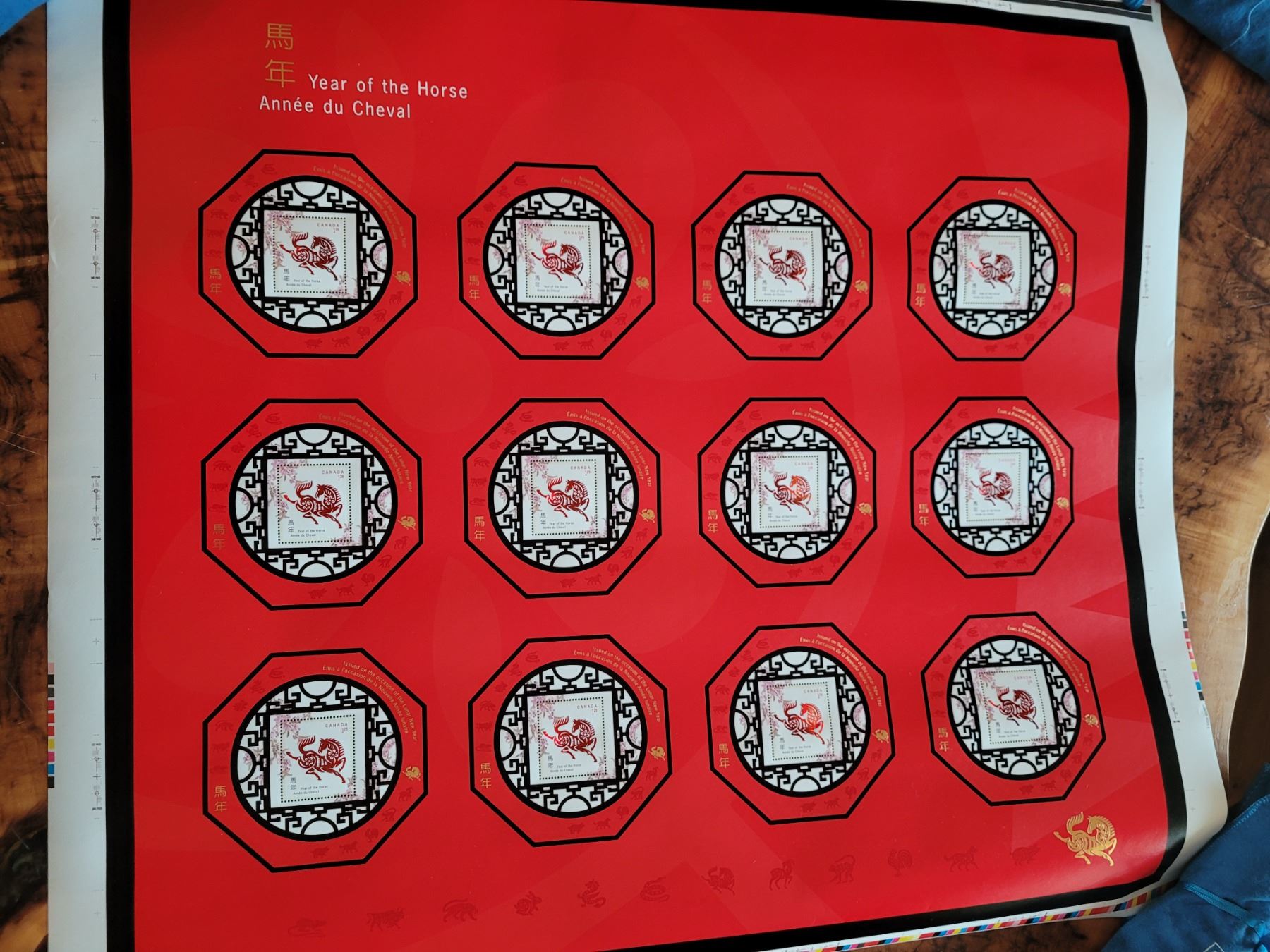 Uncut pressed sheet Canadian stamps. 12 - $1.25 stamps. 2002 year of ...