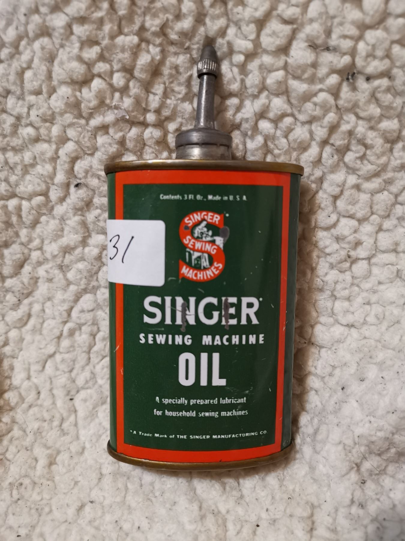 Singer oil tin can, very small - Schmalz Auctions