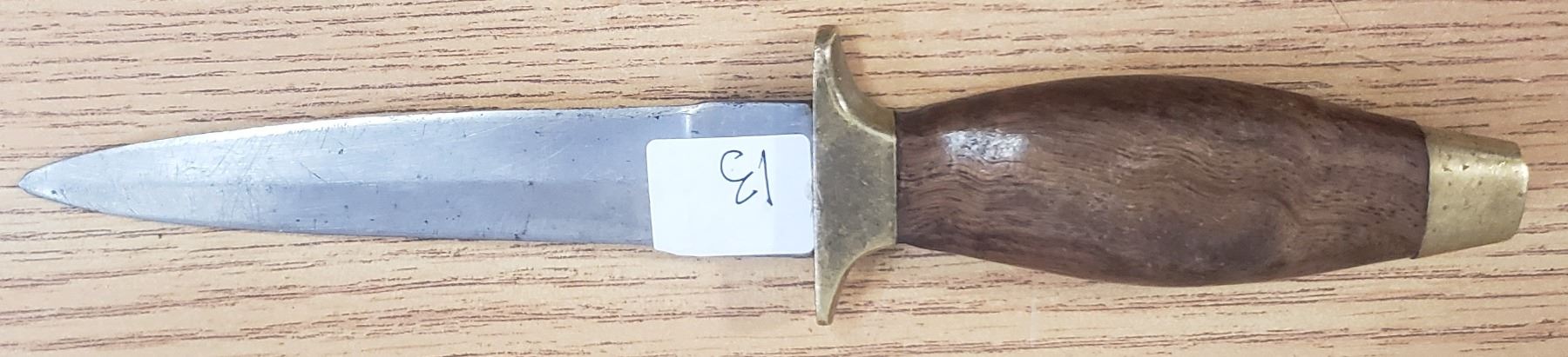 double sided dagger with walnut and brass handle