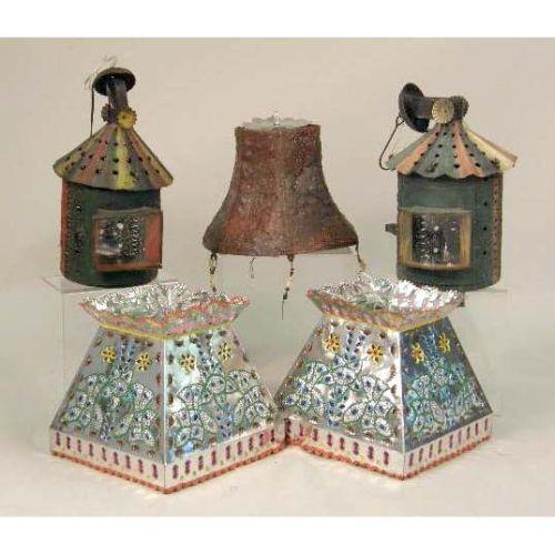 A GROUP OF MEXICAN STAMPED TIN LIGHTING FIXTURES